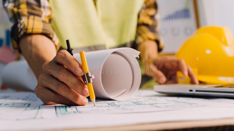 Two Colleagues Discussing Data Working and Tablet, Laptop with on on ...