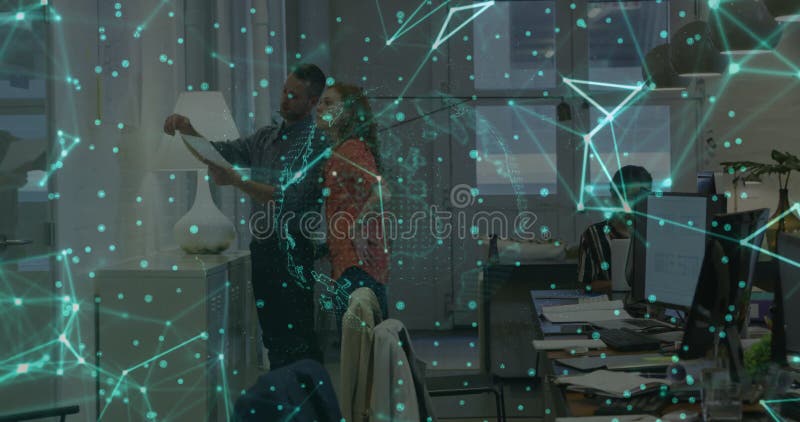 Two Colleagues Discussing Documents in Office with Digital Network ...