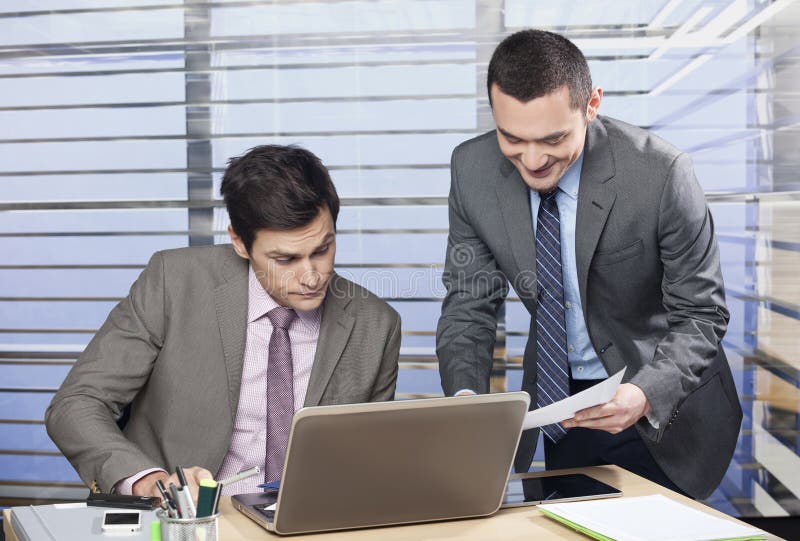 Two colleagues discussing stock photo. Image of people - 41547624