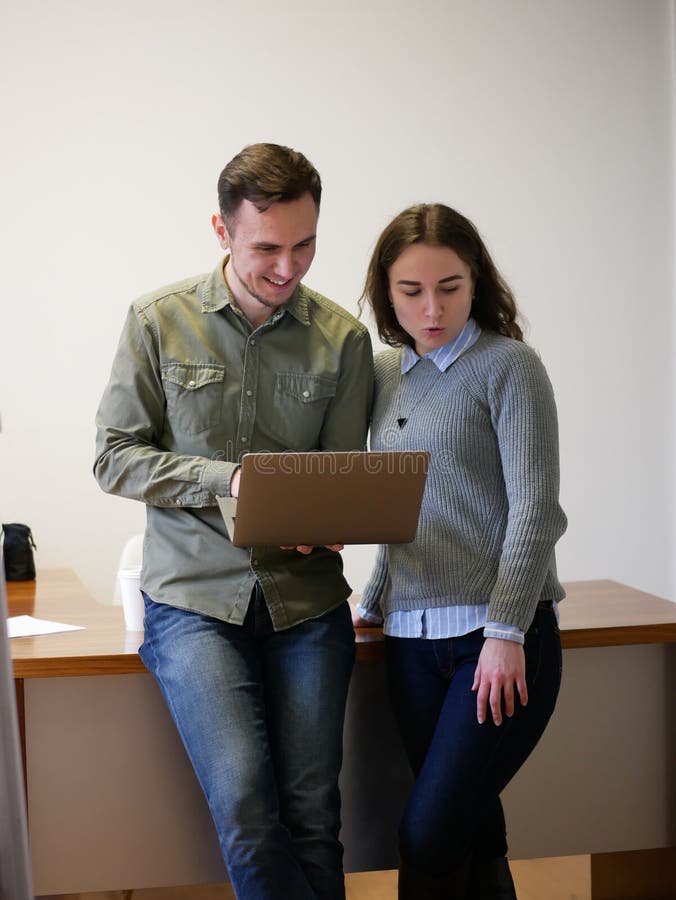 Two Colleagues Discussing Their Project Stock Image - Image of male ...