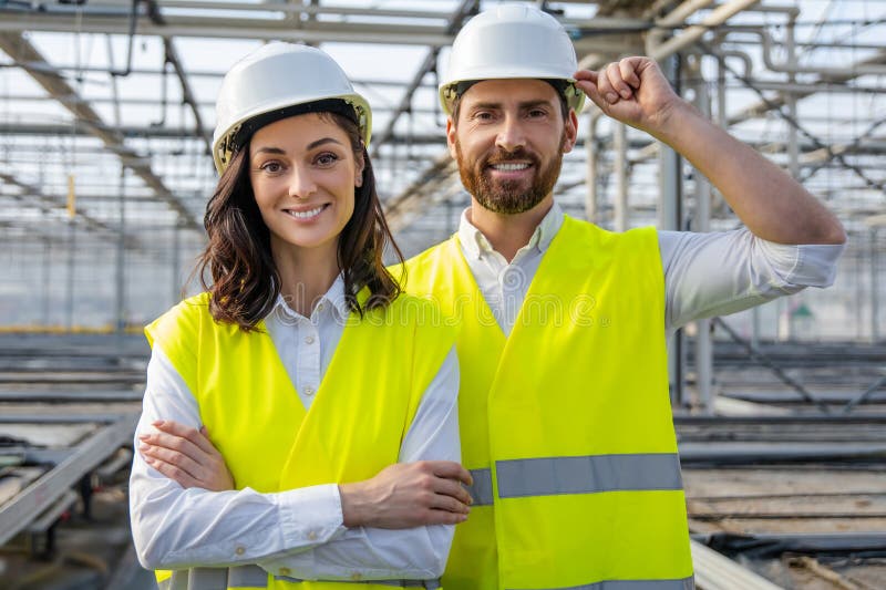 Two Colleagues Engineers Looking Confident while Working Together Stock ...