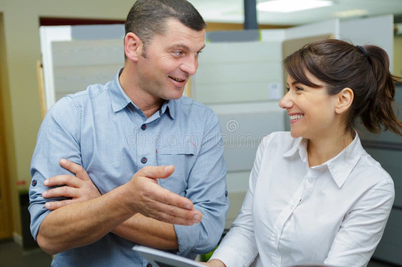 Two Colleagues Having Conversation Stock Photo - Image of meeting ... Two Colleagues Having Conversation Stock Photo - Image of meeting ...