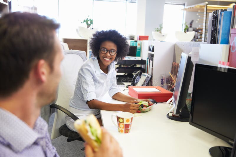 Two Colleagues Having a Lunch Break at Work Stock Photo - Image of ...