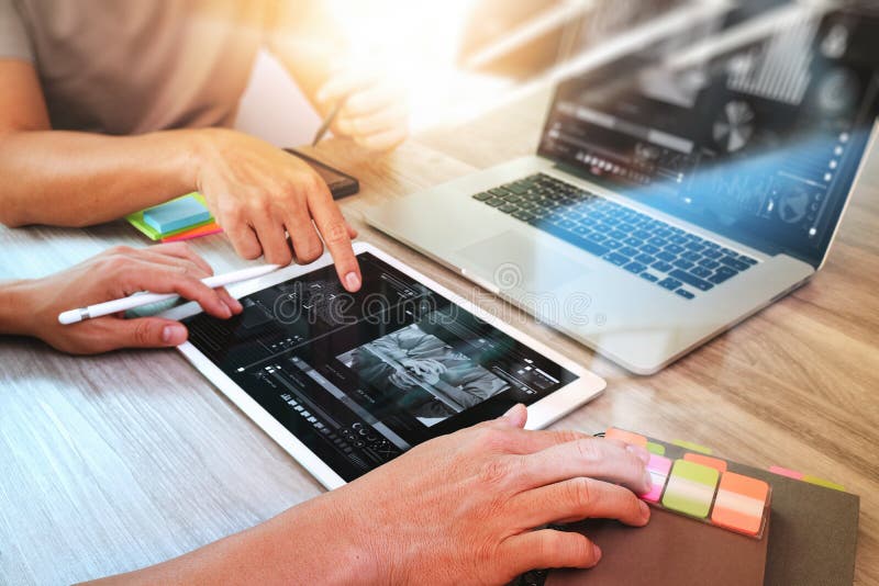 Two Colleagues Interior Designer Discussing Data and Digital Tab Stock ...