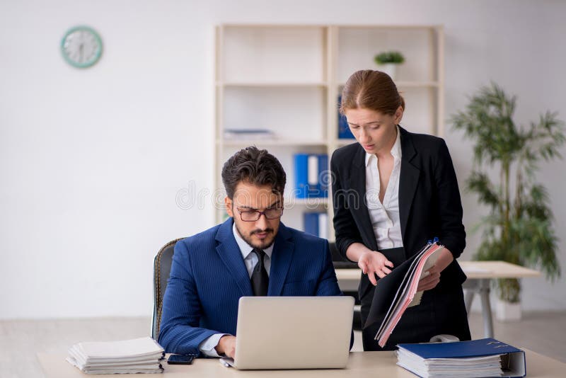Two Colleagues Working in the Office Stock Photo - Image of busy ...
