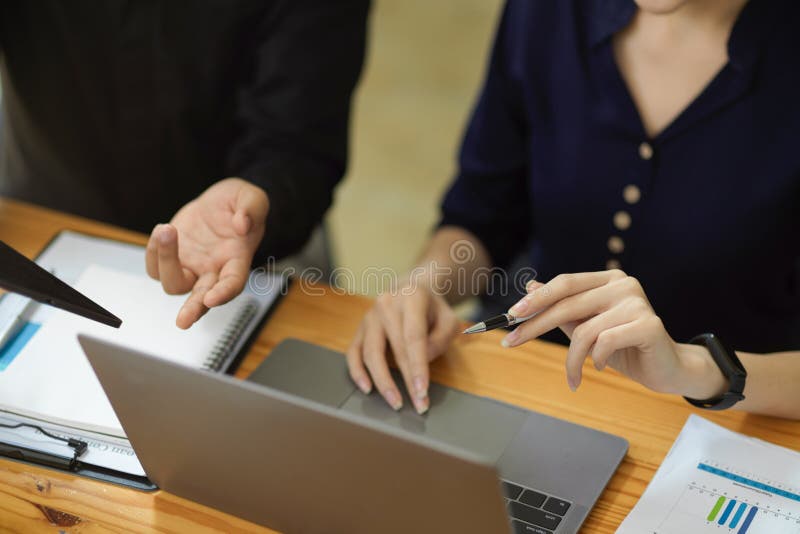 Two of Colleagues Worker Doing Their Project Together at the Office ...