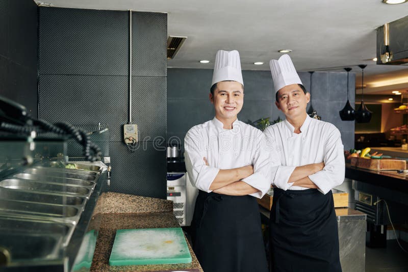 Two Colleagues Working in the Kitchen Stock Image - Image of occupation ...