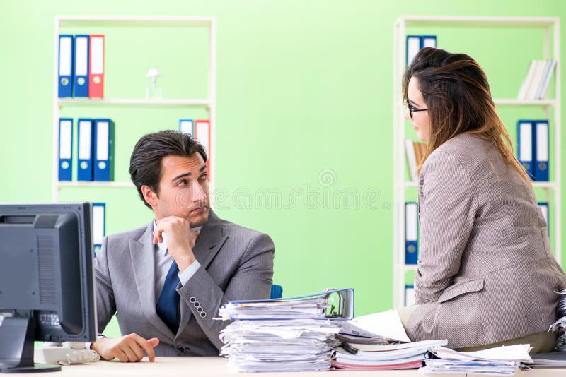 The Two Colleagues Working in the Office Stock Image - Image of ...