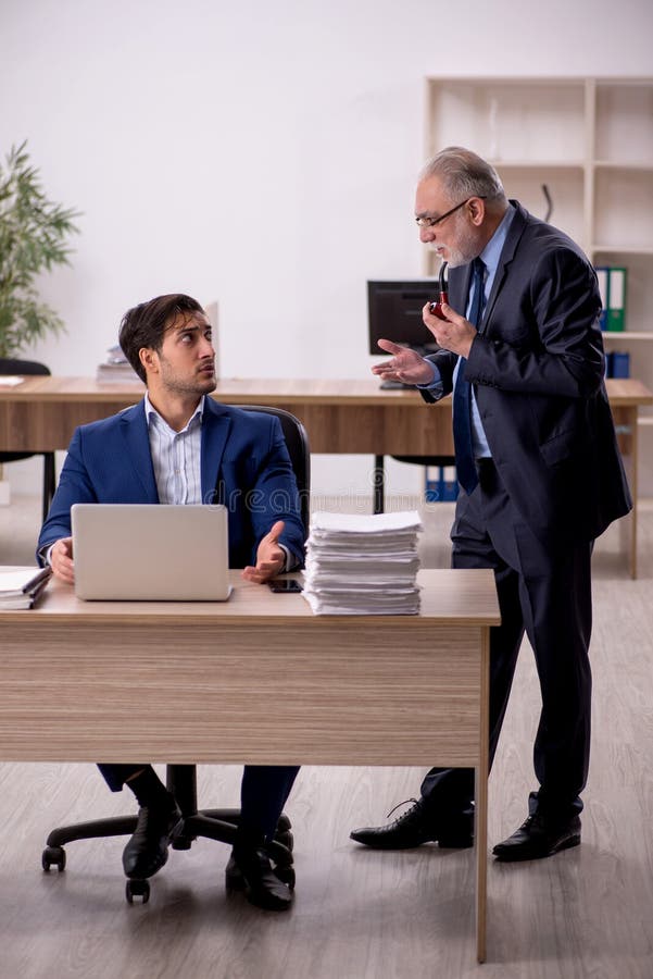 Two Male Colleagues Working in the Office Stock Photo - Image of pipe ...
