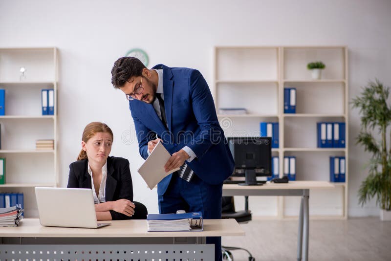 Two Colleagues Working in the Office Stock Photo - Image of woman ...