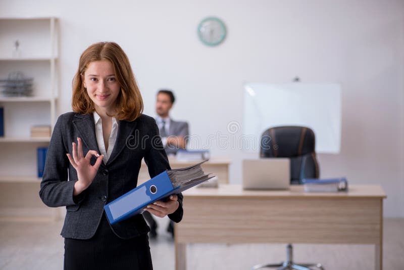 Two Colleagues Working in the Office Stock Photo - Image of heavy ...
