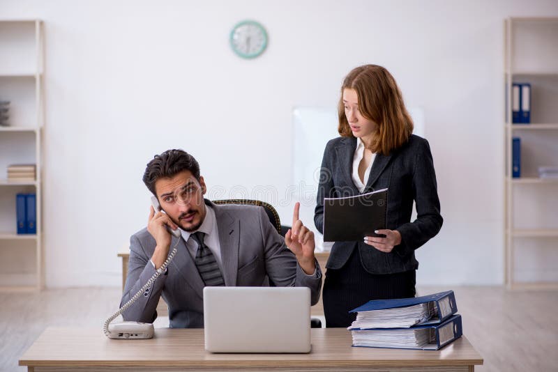 Two Colleagues Working in the Office Stock Image - Image of cautioning ...