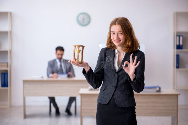 Two Colleagues Working in the Office in Time Management Concept Stock ...