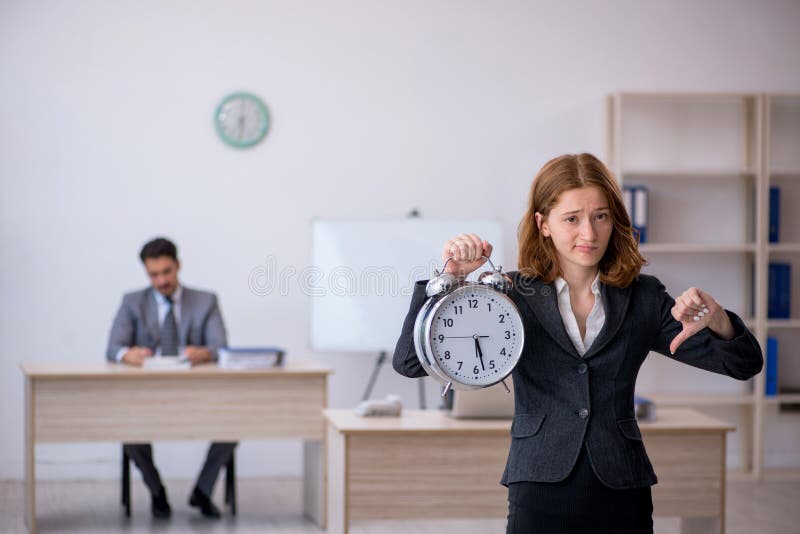 Two Colleagues Working in the Office in Time Management Concept Stock ...