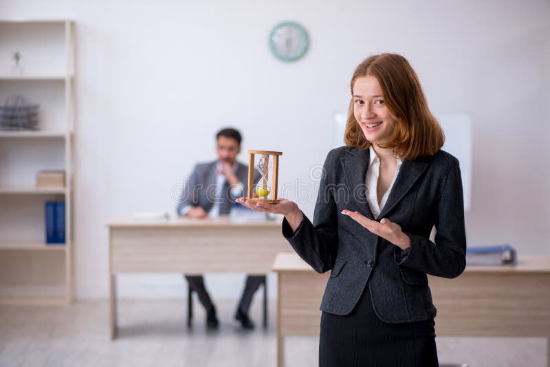 Two Colleagues Working in the Office in Time Management Concept Stock ...