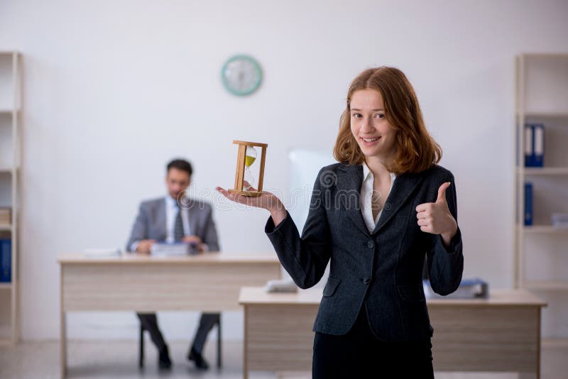 Two Colleagues Working in the Office in Time Management Concept Stock ...