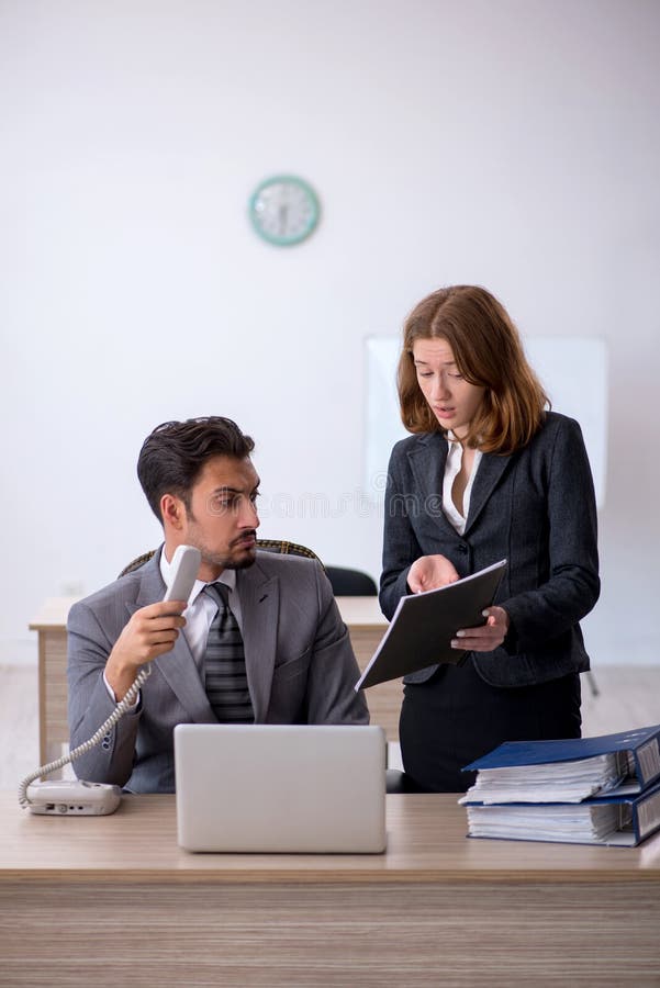 Two Colleagues Working in the Office Stock Photo - Image of thinking ...