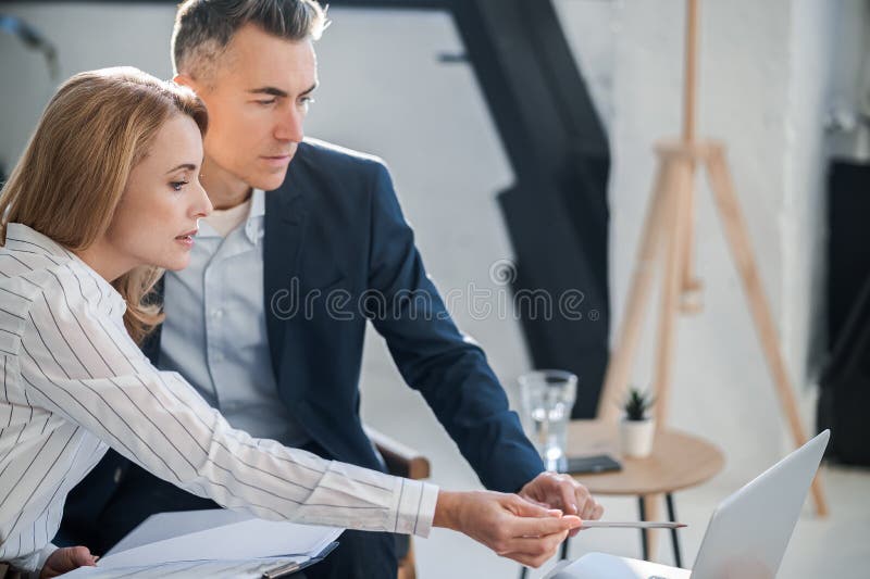 Two Colleagues Working on the Project Together Stock Image - Image of ...