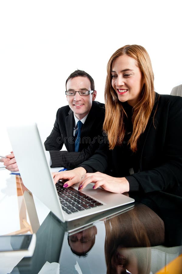 Two Colleagues Working Together on a Laptop Computer Stock Image ...