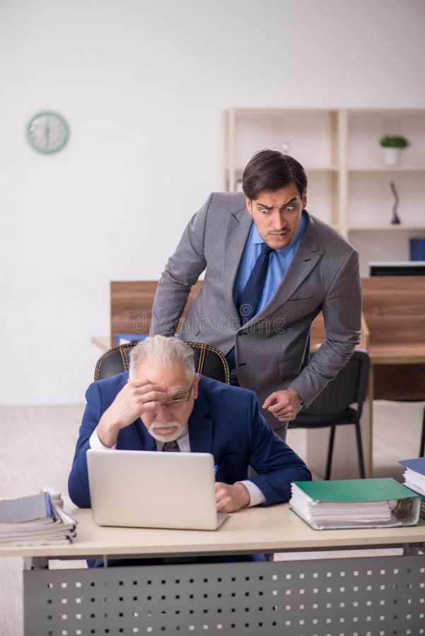 Two Male Colleagues Working in the Office Stock Image - Image of ...