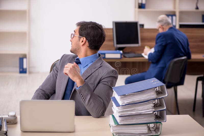 Two Male Colleagues Working in the Office Stock Photo - Image of ...