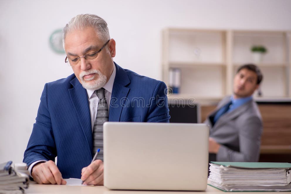 Two Male Colleagues Working in the Office Stock Photo - Image of ...