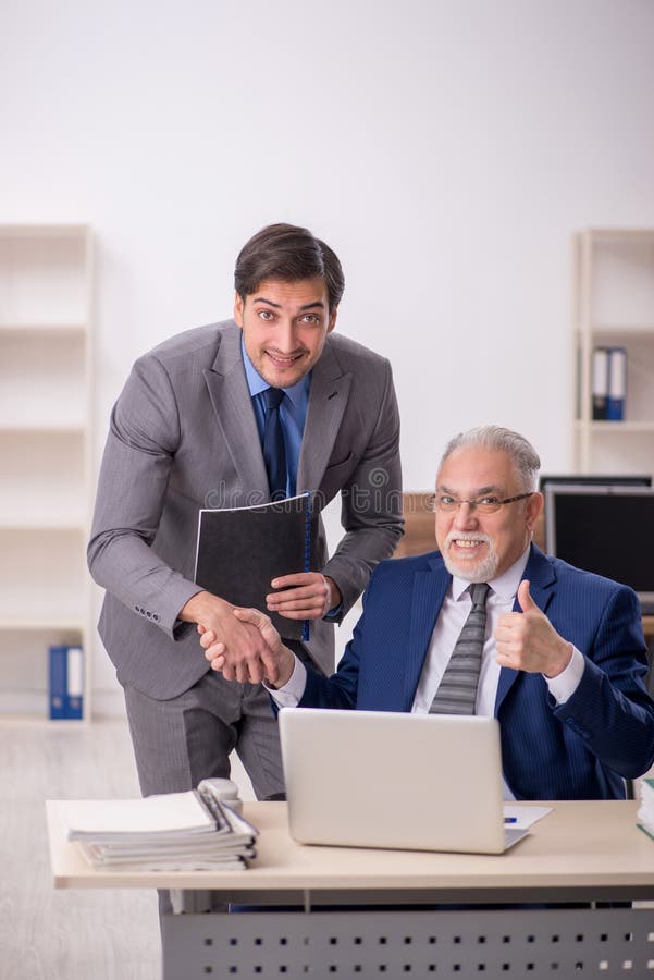 Two Male Colleagues Working in the Office Stock Image - Image of team ...