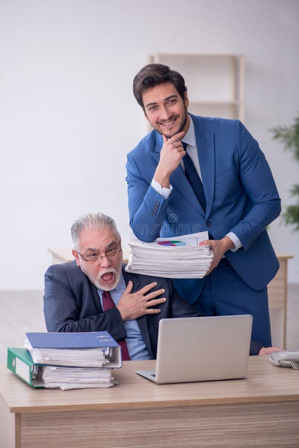 Two Male Colleagues Working in the Office Stock Photo - Image of ...