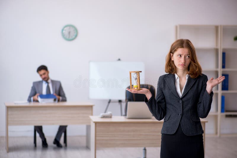 Two Colleagues Working in the Office in Time Management Concept Stock ...