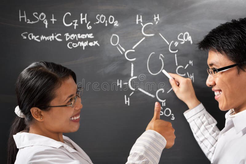 Two College Student Solving Chmestry Problem Stock Photo - Image of ...