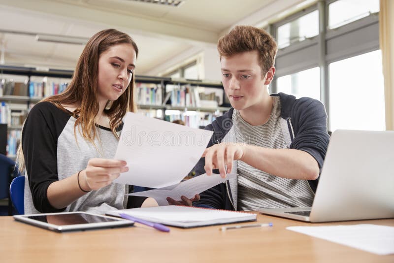 Female Student Working at Laptop in College Library Stock Photo - Image ...
