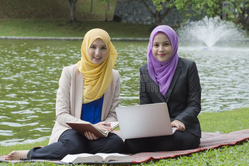 Two College Students Having Discussion and Changing Ideas while Sitting ...