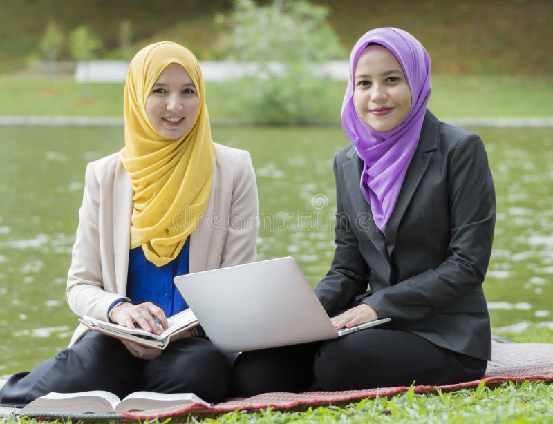 Two College Students Having Discussion and Changing Ideas while Sitting ...