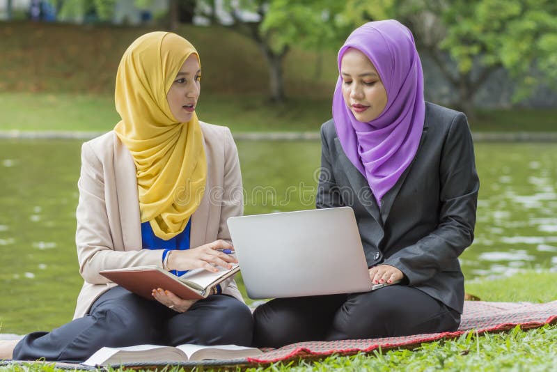 Two College Students Having Discussion and Changing Ideas while Sitting ...