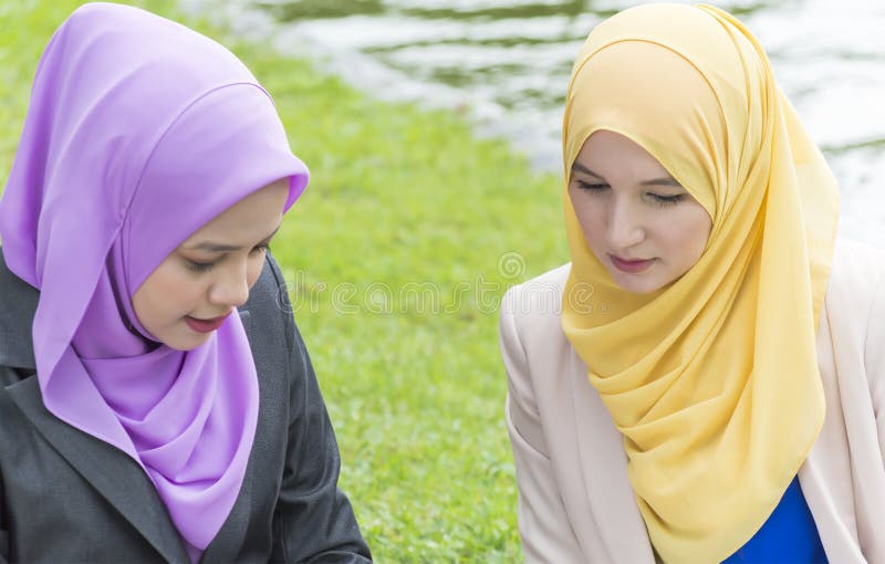 Two College Students Having Discussion and Changing Ideas while Sitting ...