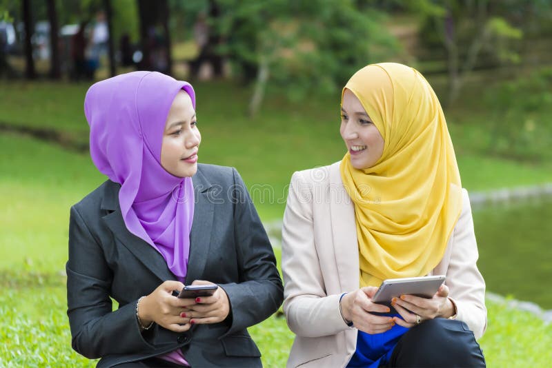 Two College Students Having Discussion and Changing Ideas while Sitting ...