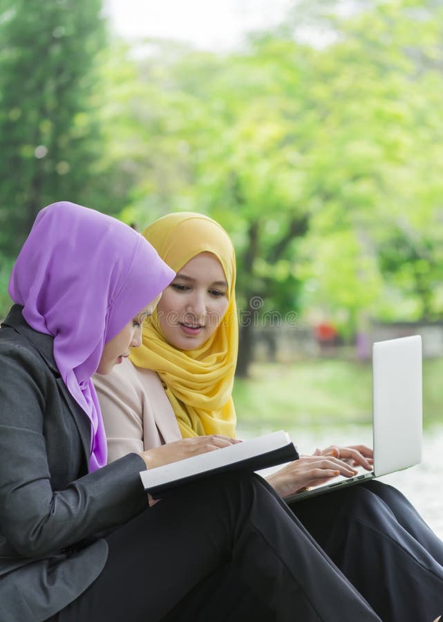 Two College Students Having Discussion and Changing Ideas while Sitting ...