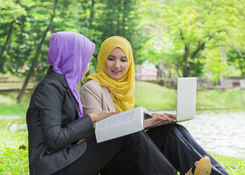 Two College Students Having Discussion and Changing Ideas while Sitting ...