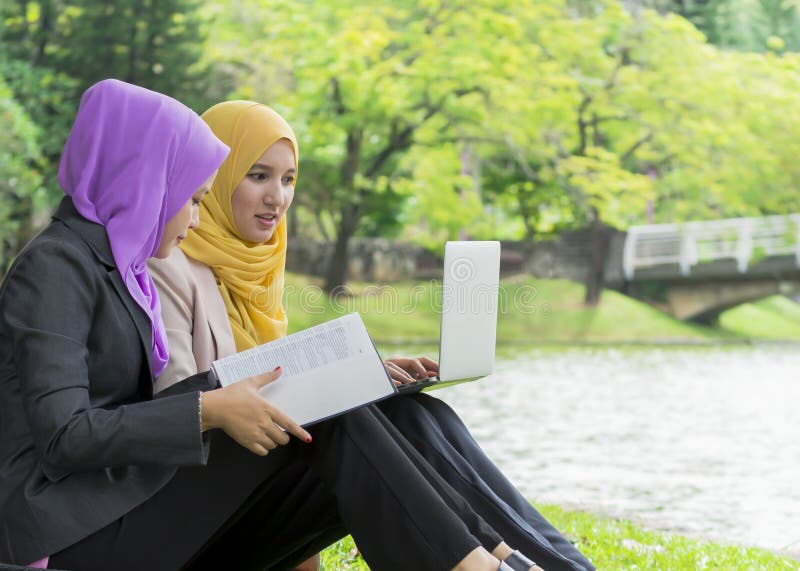 Two College Students Having Discussion and Changing Ideas while Sitting ...