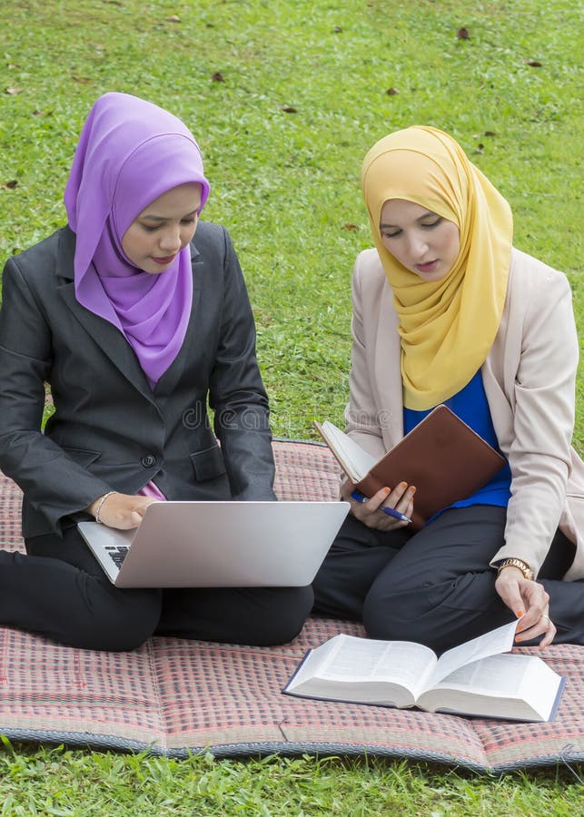 Two College Students Having Discussion and Changing Ideas while Sitting ...