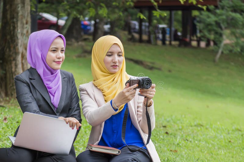 Two College Students Having Discussion and Changing Ideas while Sitting ...