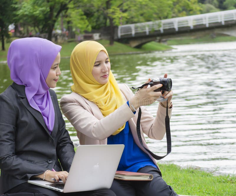 Two College Students Having Discussion and Changing Ideas while Sitting ...