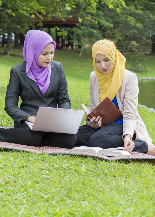 Two College Students Having Discussion and Changing Ideas while Sitting ...
