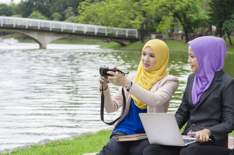Two College Students Having Discussion and Changing Ideas while Sitting ...