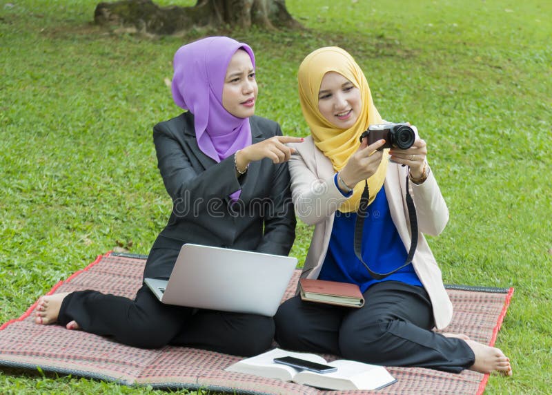 Two College Students Having Discussion and Changing Ideas while Sitting ...