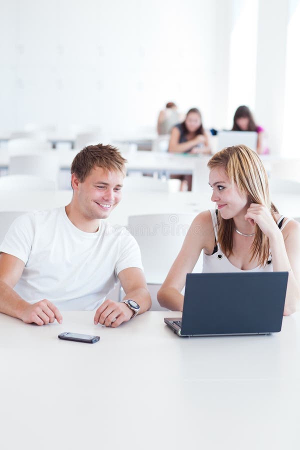 Two College Students Having Fun Studying Together Stock Photo - Image ...
