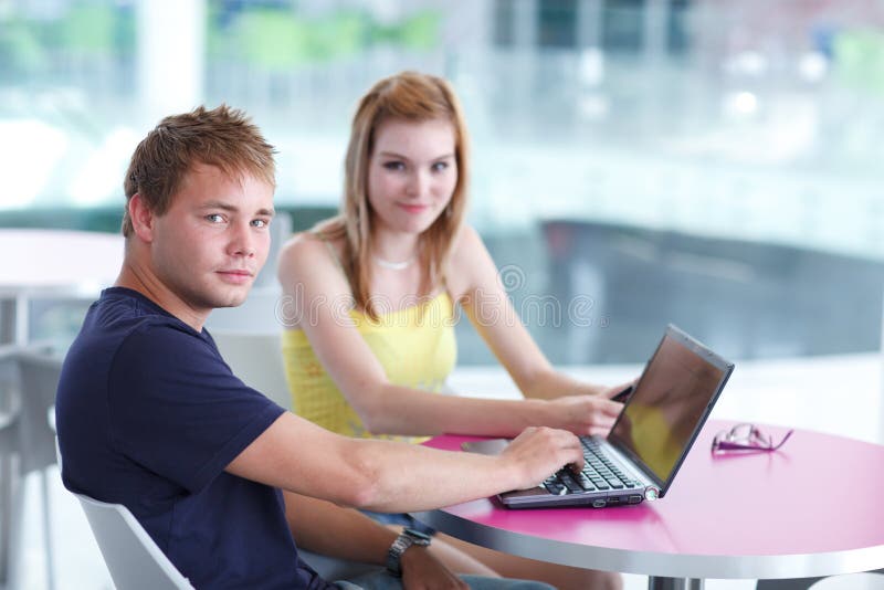 Two College Students Having Fun Studying Together Stock Image - Image ...
