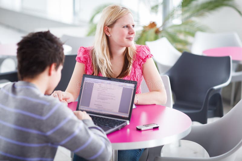 Two College Students Having Fun Studying Together Stock Photo - Image ...