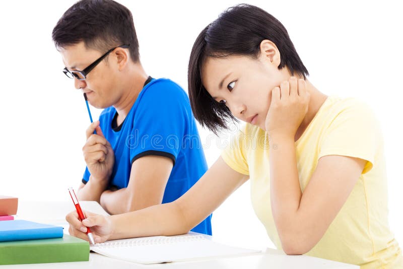 Two College Students Sitting an Exam in a Classroom Stock Image - Image ...