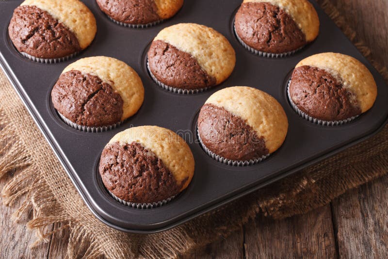 Two-color Muffins in Baking Dish Closeup. Horizontal Stock Photo ...